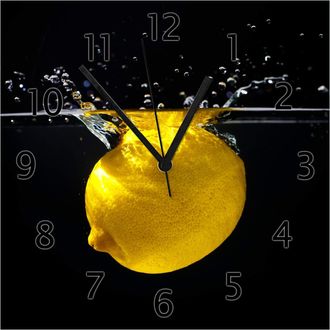 Wallario Design-Wanduhr Zitrone im Wasser - Frisches Obst für die Küche aus Glas, Motiv-Uhr Größe 30 x 30 cm, Schwarze Zeiger