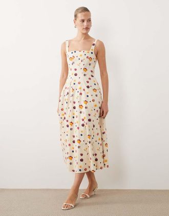 Abercrombie & Fitch Robe mi-longue sans manches avec ourlet &agrave; godets et imprim&eacute; fleuri - Cr&egrave;me-Blanc