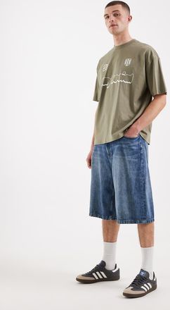 Tommy Jeans Theo - Weite Jeansshorts in dunkelblauer Waschung