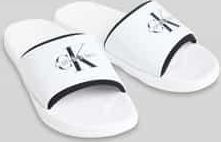 Calvin Klein Badeschuhe mit Logo Print