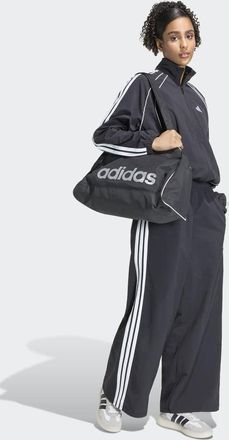 adidas adidas Performance - Iconic - Pantalon de surv&ecirc;tement large tiss&eacute; avec cordons &eacute;lastiques - Noir et blanc