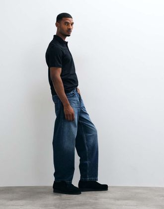 Asos lockere Jeans in dunkler Waschung Blau mit Falten und Schnalle
