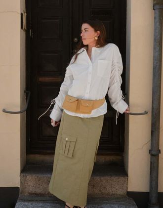 NA-KD x Charlotte Olivia jupe cargo &agrave; poches vert mousse