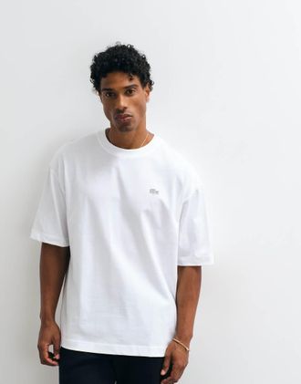 Lacoste T-Shirt mit kurzen &Auml;rmeln und schwerem Baumwollmaterial mit Logo in Wei&szlig;