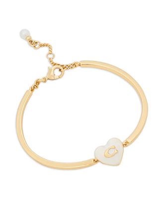 Coach bracelet &agrave; breloque coeur - Or