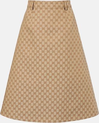 Gucci Jupe midi en toile GG
