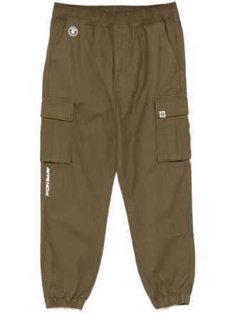 Aape By A Bathing Ape pantalon fuselé à poches cargo - Vert