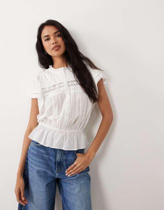 Gina Tricot Gina Tricot - Blouse sans manches en coton &agrave; broderies - Blanc