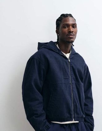 Cotton On kurze Bomberjacke mit Kapuze in verwaschenem Indigo-Blau