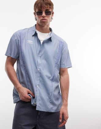Umbro Chemise coupe carr&eacute;e avec manches courtes &agrave; rayures - Bleu