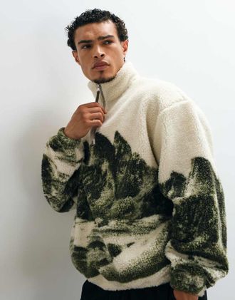 Asos Oversize-Sweatshirt aus Borg mit Viertelrei&szlig;verschluss und Bergprint in Gr&uuml;n