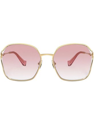 Miu Miu Eyewear lunettes de soleil &agrave; monture oversize - Or