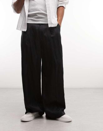 Weekday Elegante Hose in Schwarz mit weitem Bein und Bundfalten