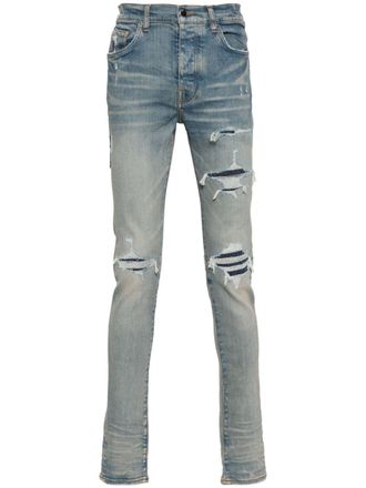 Amiri jean skinny à effet usé - Bleu