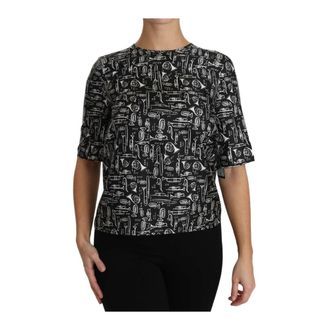 Dolce & Gabbana Exquisite Seidenbluse mit Trompetenmuster - - Blouses & Shirts - Damen - Schwarzk - S