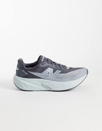 New Balance Fuelcell Rebel v5 Herren-Laufsneaker in Grau und Gr&uuml;n-Lila