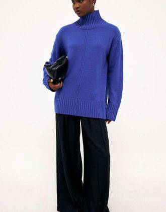 NA-KD pull en maille &agrave; col roul&eacute; avec d&eacute;tail de couture bleu