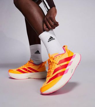 adidas adidas Running - Adizero EVO SL ATR - Sneaker in Rosa, Orange und Rot, exklusiv bei ASOS
