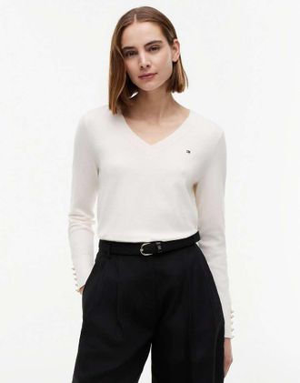 Tommy Hilfiger Pull &agrave; col V et boutons dor&eacute;s aux poignets - Blanc-Jaune