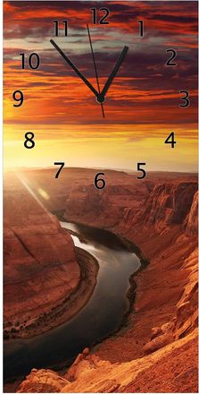 Wallario Design-Wanduhr Grand Canyon bei Sonnenuntergang aus Glas, Motiv-Uhr Gr&ouml;&szlig;e 30 x 60 cm, Schwarze Zeiger