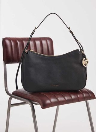 Michael Kors grand sac port&eacute; &eacute;paule Nolita en cuir noir