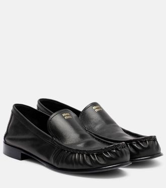 Miu Miu Mocassins en cuir &agrave; logo