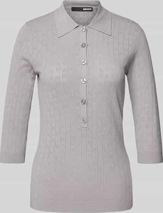 Rotate Slim Fit Poloshirt in Strick-Optik