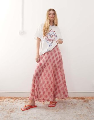 Reclaimed Vintage Jupe longue coupe circulaire transparente à carreaux style festival - Rose-Multicolore