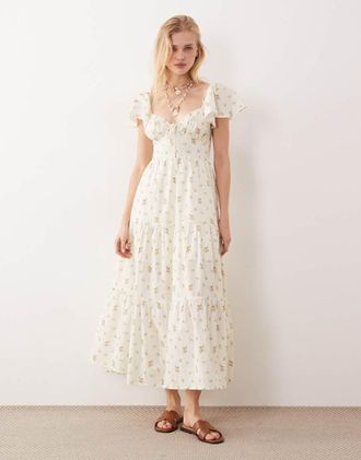 Kiss The Sky Bella - Robe champ&ecirc;tre longueur mollet &agrave; fleurs et manches &eacute;vas&eacute;es - Cr&egrave;me p&ecirc;che-Blanc