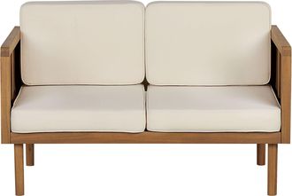 Beliani Outdoor 2-Sitzer Loungesofa Akazienholz Hellbraun Auflagen beige Rustikal Baratti