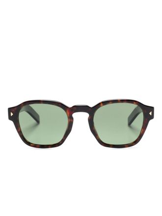 Prada lunettes de soleil à logo gravé - Marron