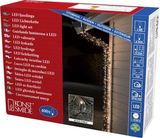 Konstsmide Micro LED Lichterkette, 400 warm wei&szlig;e Dioden, 24V Au&szlig;entrafo, schwarzes Kabel - 3644-110, Warmwei&szlig;