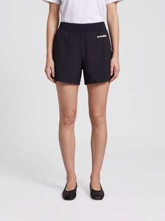 Jil Sander Short de jogging en tissu technique taille haute avec logo contrastant