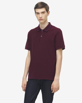 Alexander McQueen Poloshirt mit McQueen Logo - Item 847736QXAAK5050