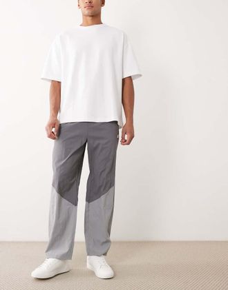 New Balance Sport Legacy - Hose in Grau