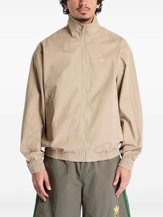 adidas veste de sport Firebird à rayures - Tons neutres