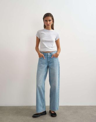 Topshop Jean d&eacute;contract&eacute; d&eacute;lav&eacute; &agrave; taille basse cintr&eacute;e-Bleu