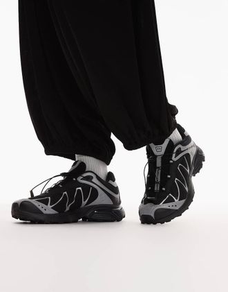 Salomon XT-Whisper Nocturne Vision - Sneaker in Schwarz und Silber