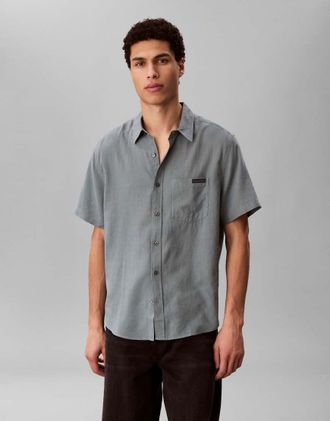 Calvin Klein Jeans Chemise casual en lin &agrave; manches courtes - Vert d&eacute;lav&eacute;