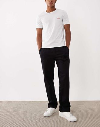 HUGO BOSS HUGO Red - Dumrulo - Jogginghose in Schwarz mit gleichfarbigem Logo