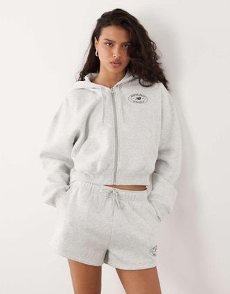 New Balance sweat polaire zipp&eacute; int&eacute;gral gris