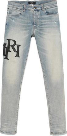Amiri Staggered Logo Skinny Jeans