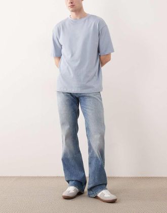 Tommy Jeans Robbie - Bootcut-Jeans in mittelblauer Waschung