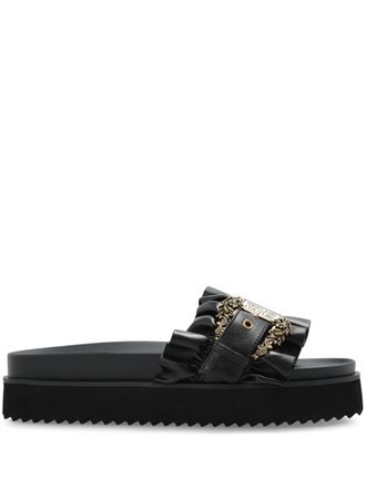 Versace Jeans Couture claquettes à logo gravé - Noir