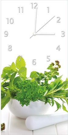 Wallario Design-Wanduhr Welt der Kräuter - Verschiedene Kräuter in einem weißen Mörser aus Glas, Motiv-Uhr Größe 30 x 60 cm, weiße Zeiger