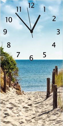 Wallario Design-Wanduhr Auf dem Sandweg zum Strand aus Glas, Motiv-Uhr Gr&ouml;&szlig;e 30 x 60 cm, Schwarze Zeiger