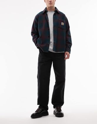 Carhartt Work in Progress Single Knee - Gerade geschnittene Hose in Schwarz mit Abnutzungen