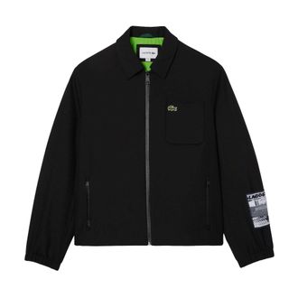 Lacoste Trainingsjacke f&uuml;r Herren, Kostrastfarbenes Futter (Schwarz)