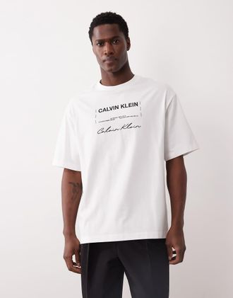 Calvin Klein Jeans T-shirt d&eacute;contract&eacute; &agrave; imprim&eacute; graphique - Blanc