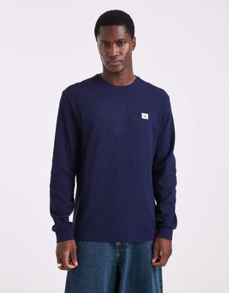 Calvin Klein Jeans T-shirt &agrave; manches longues en tissu gaufr&eacute; avec &eacute;cusson &agrave; logo - Bleu marine
